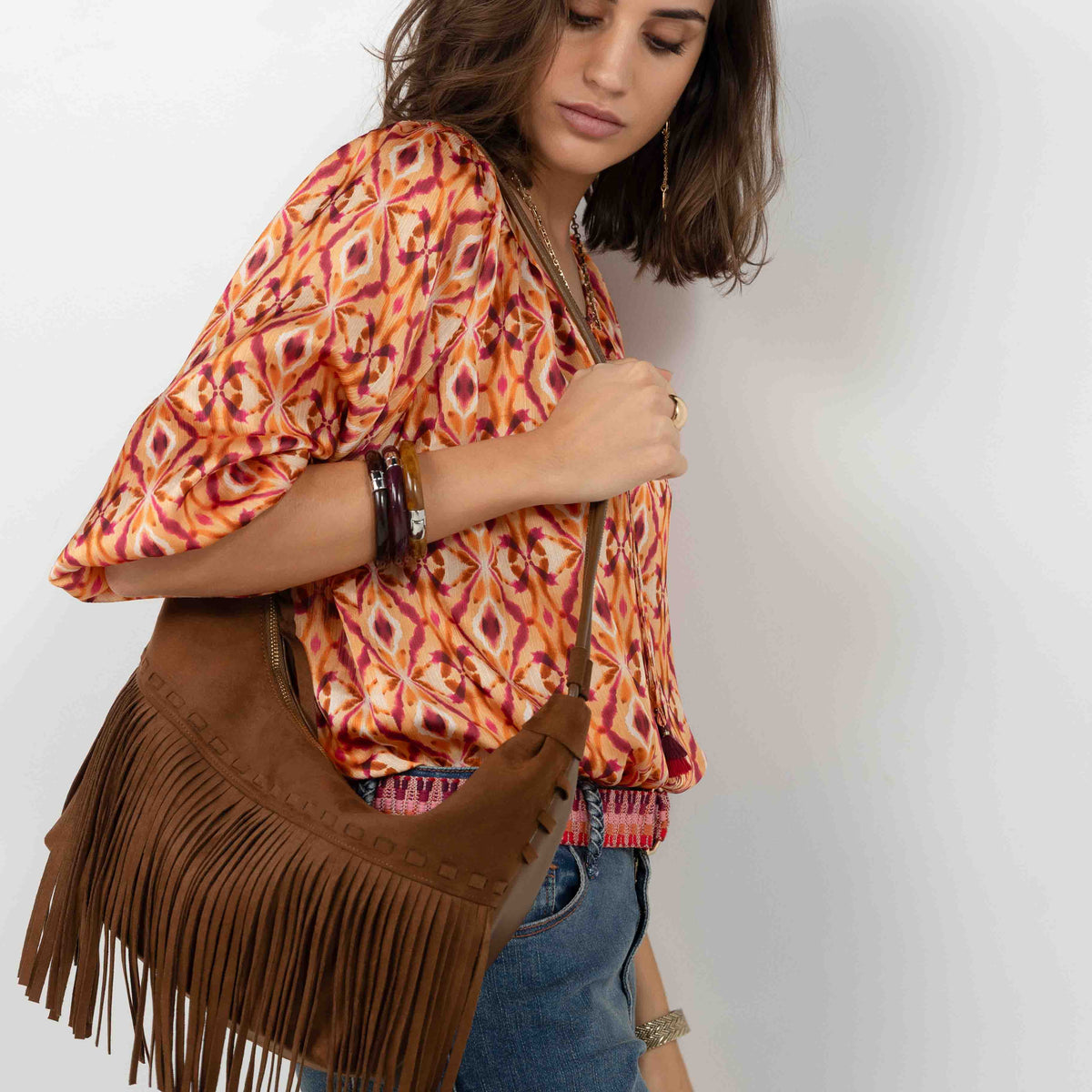 Chocolate fringe bag with a western vibe – Elora